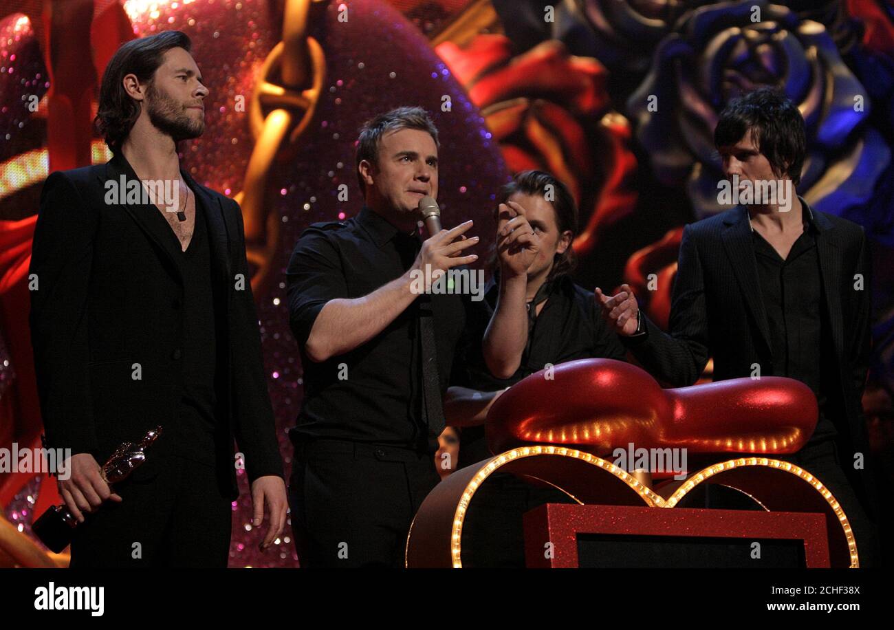 Take that collect their award on stage hi-res stock photography and ...