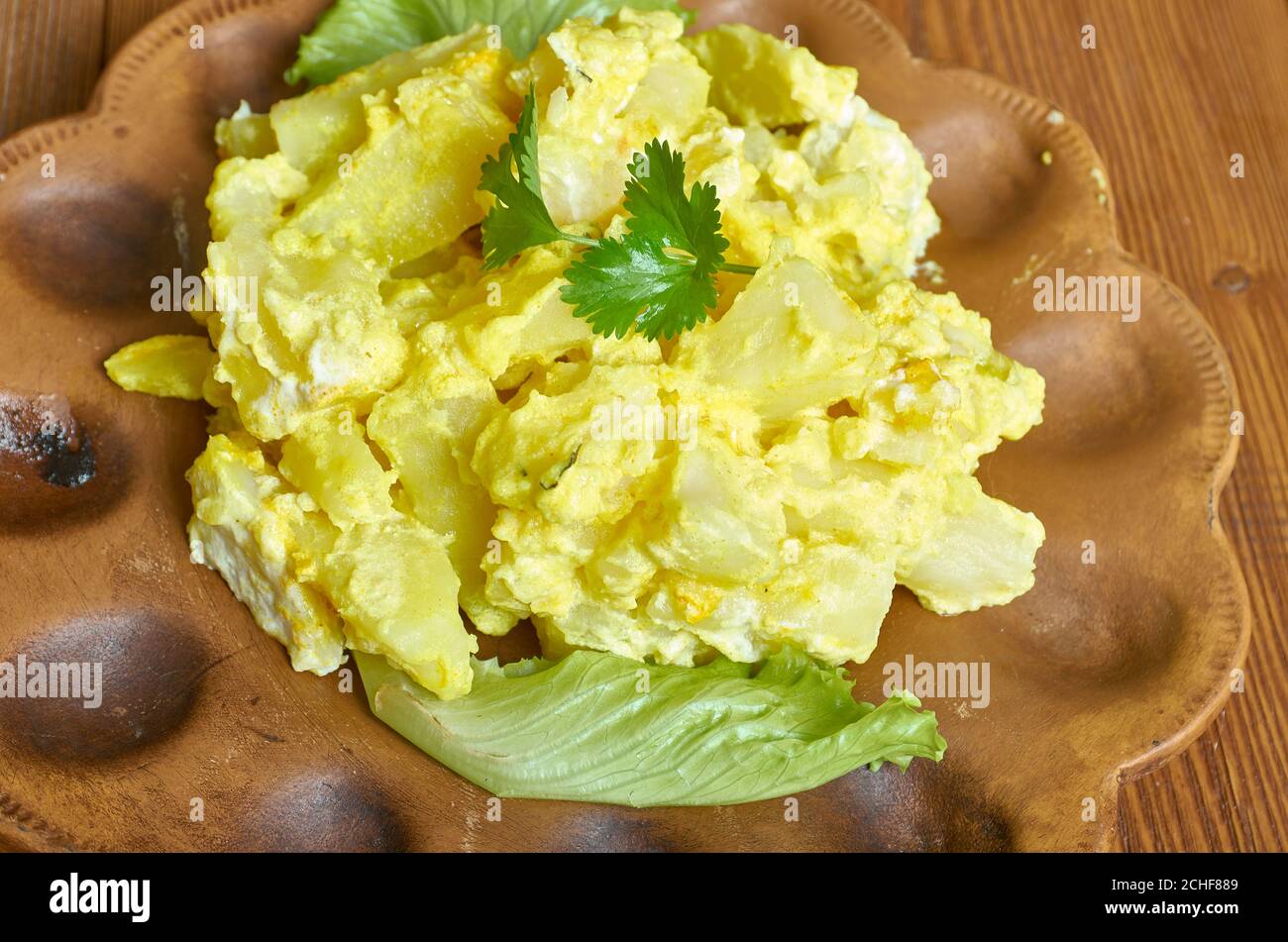 Denich Wot - Potato stew made in medium spicy curry and cumin sauce ...