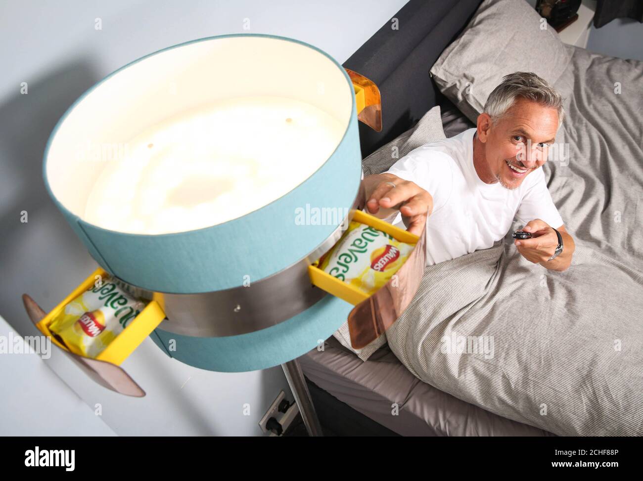 Gary Lineker tests out a range of 'unhackable' snack-hiding devices ...