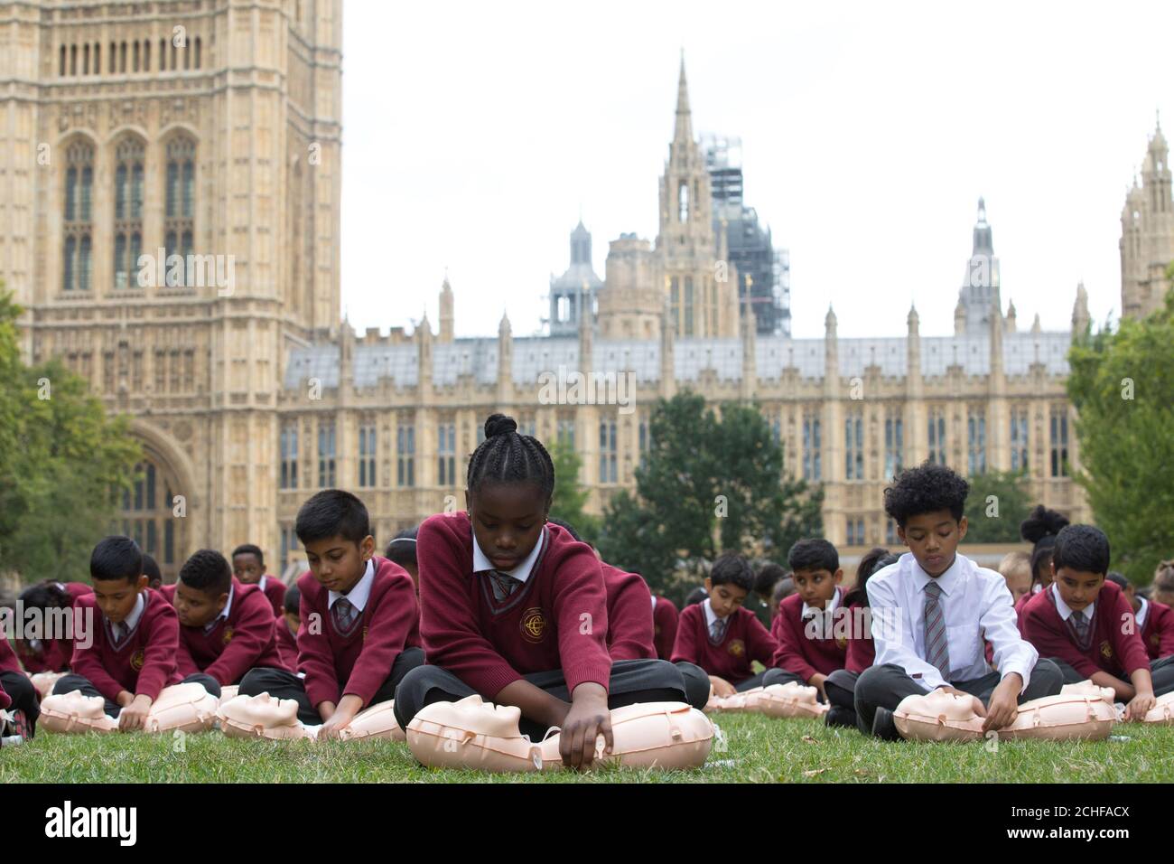 EDITORIAL USE ONLY School children from Ark Oval Primary Academy school ...