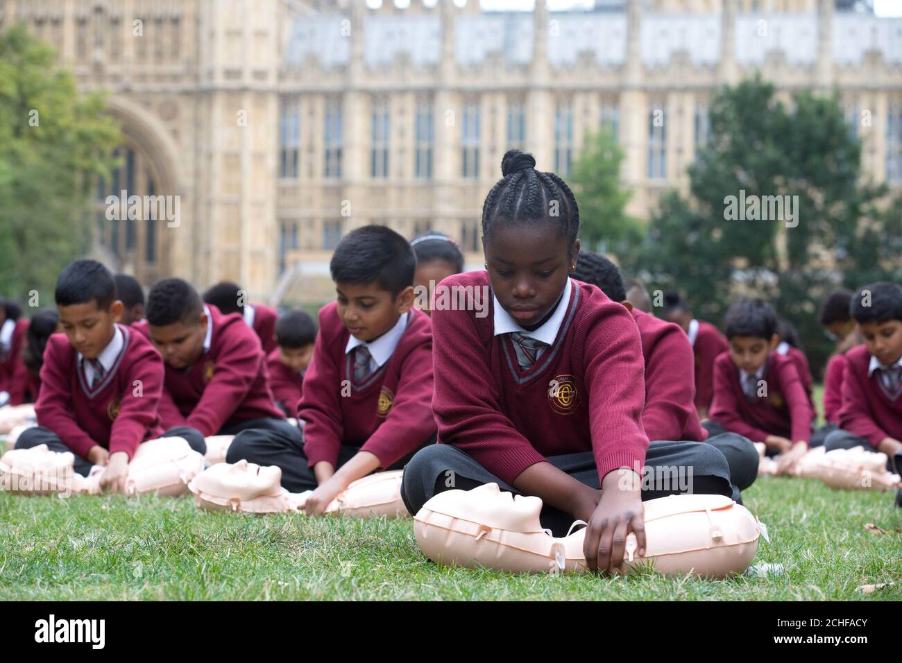 EDITORIAL USE ONLY School children from Ark Oval Primary Academy school ...