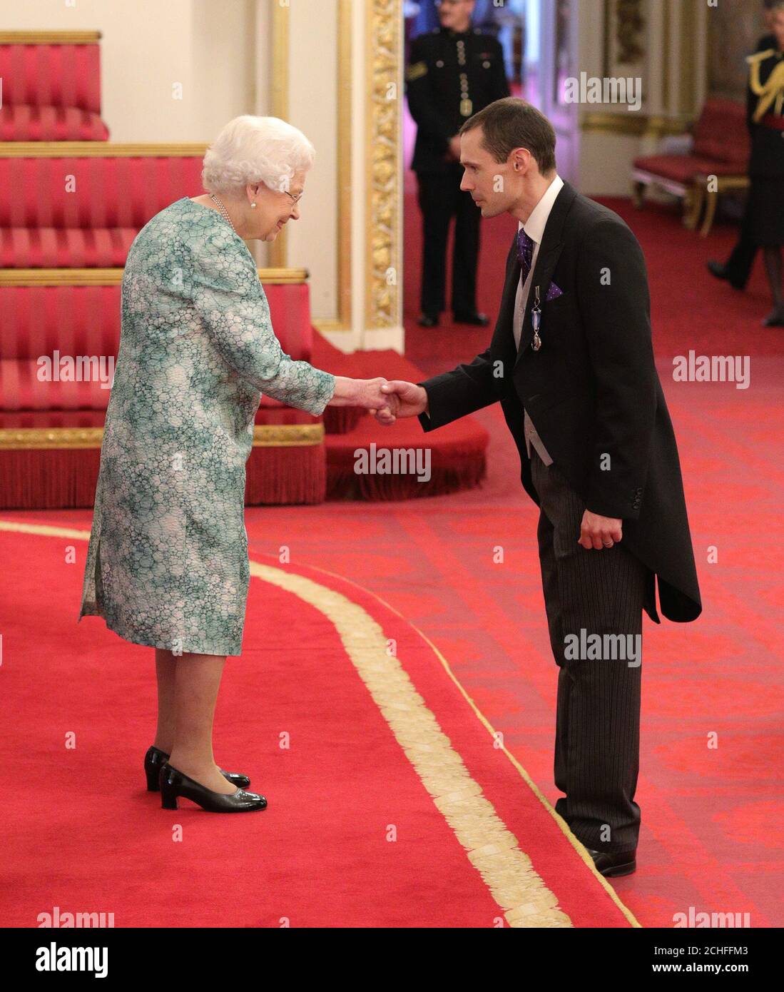 Mr. Christopher Jewell is decorated with the Queen's Gallantry Medal by ...