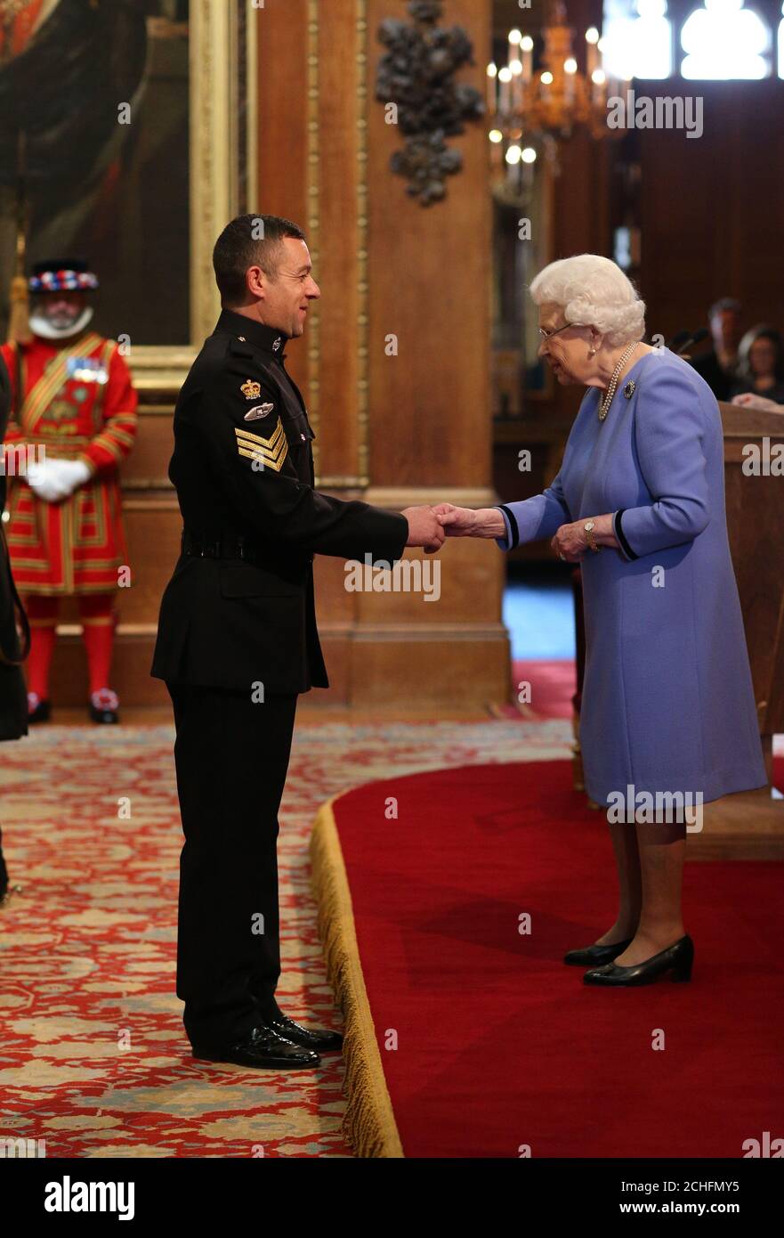 Staff Sergeant Stuart Griffiths is decorated with the Queen's Gallantry ...