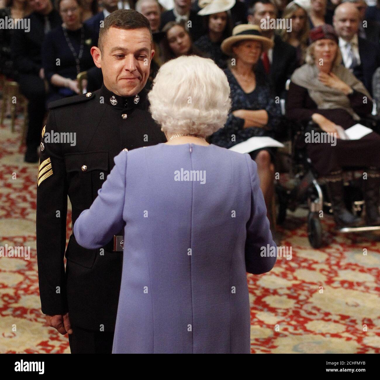 Staff Sergeant Stuart Griffiths is decorated with the Queen's Gallantry ...