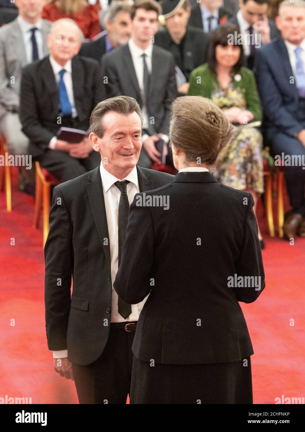During investiture ceremony buckingham palace hi-res stock photography ...