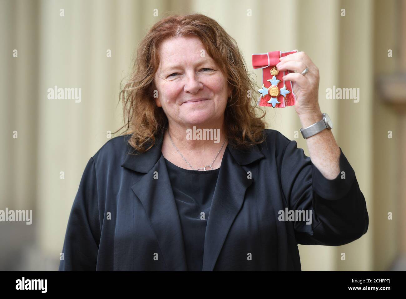 Rachel Whiteread with her Dame Commander medal presented by the Prince ...