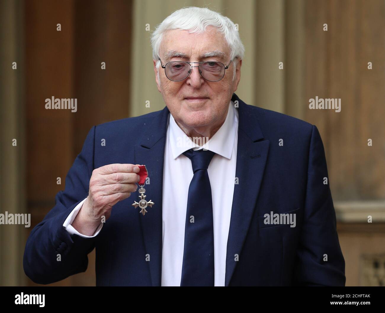 Snooker commentator Clive Everton MBE following an investiture ceremony ...