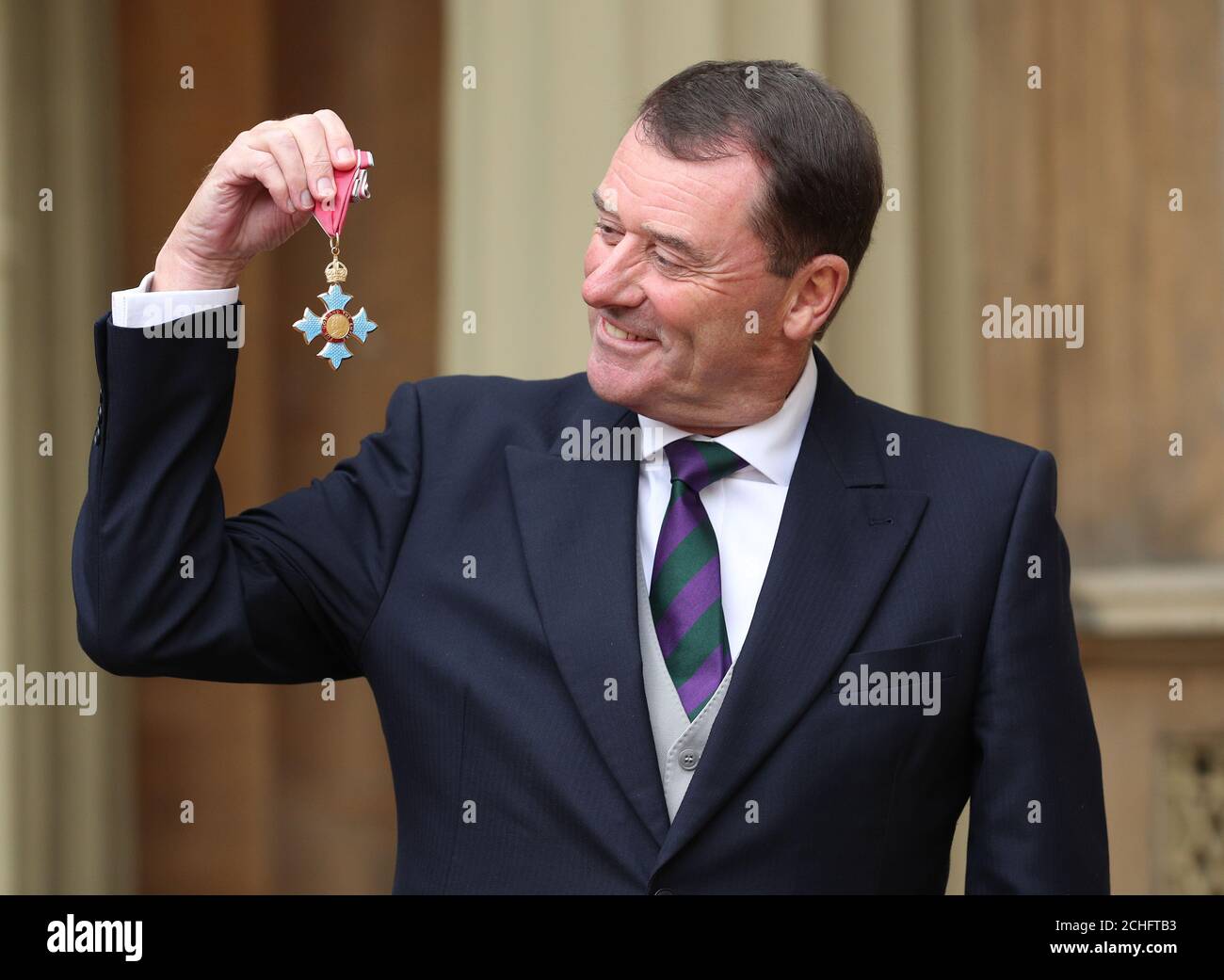 Philip Brook CBE, Wimbledon chairman, following an investiture ceremony ...