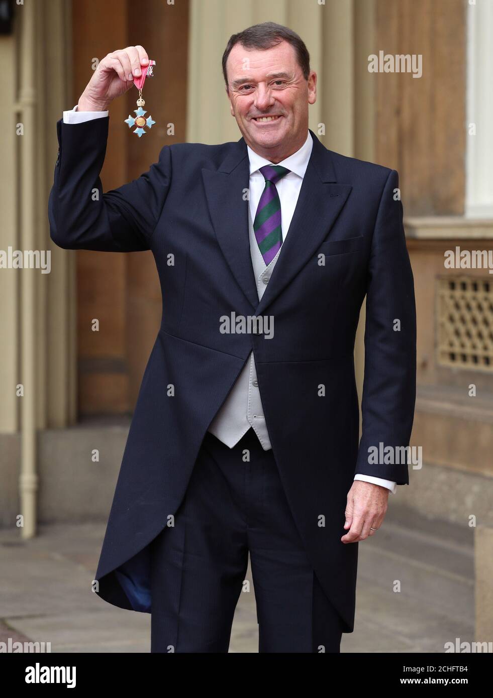 Philip Brook CBE, Wimbledon chairman, following an investiture ceremony ...
