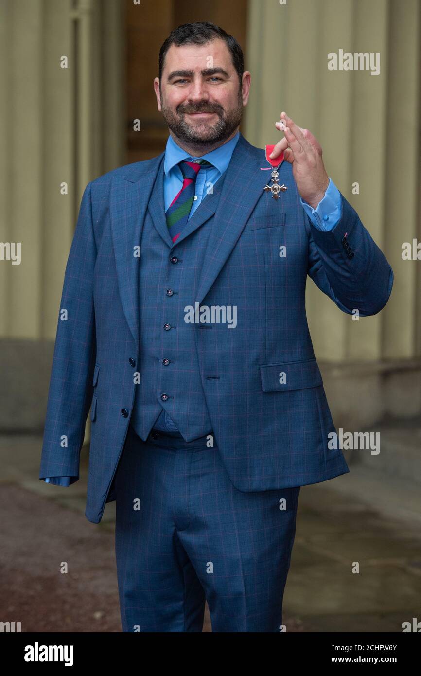 Andy Reid with his MBE medal, following an investiture ceremony at ...