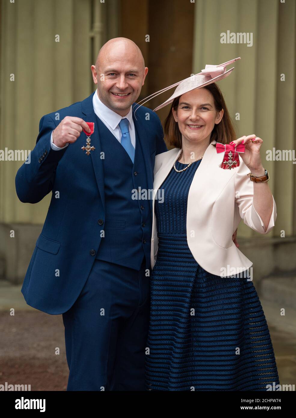 Peter and Kathryn Shippey with their MBE medals, following an ...