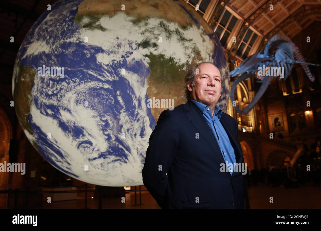 EDITORIAL USE ONLY Composer Hans Zimmer underneath Luke Jerram's 'Earth ...