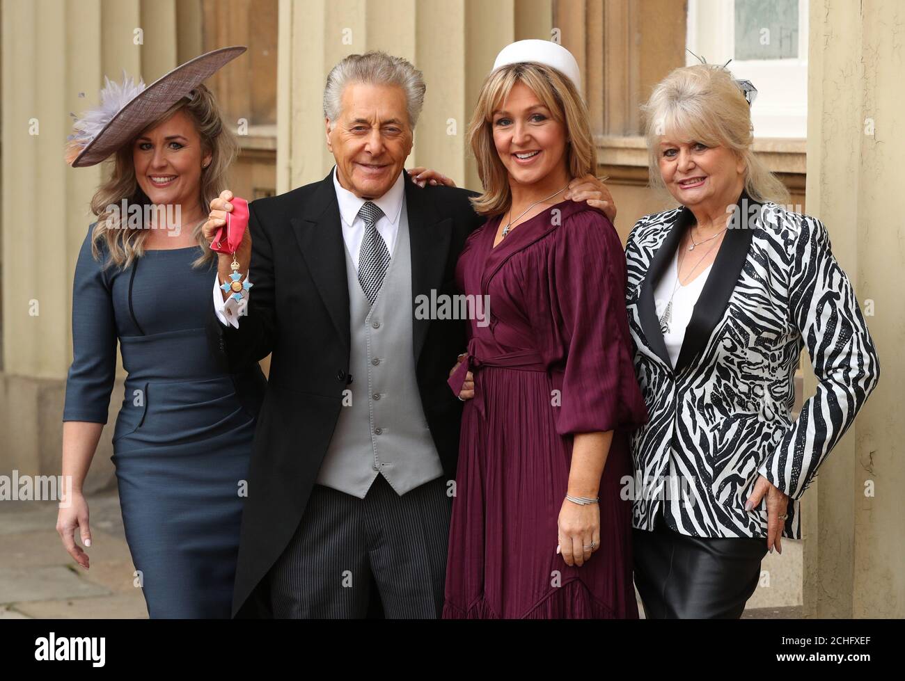 Mitch Murray (second left) is accompanied by daughters Mazz Murray ...