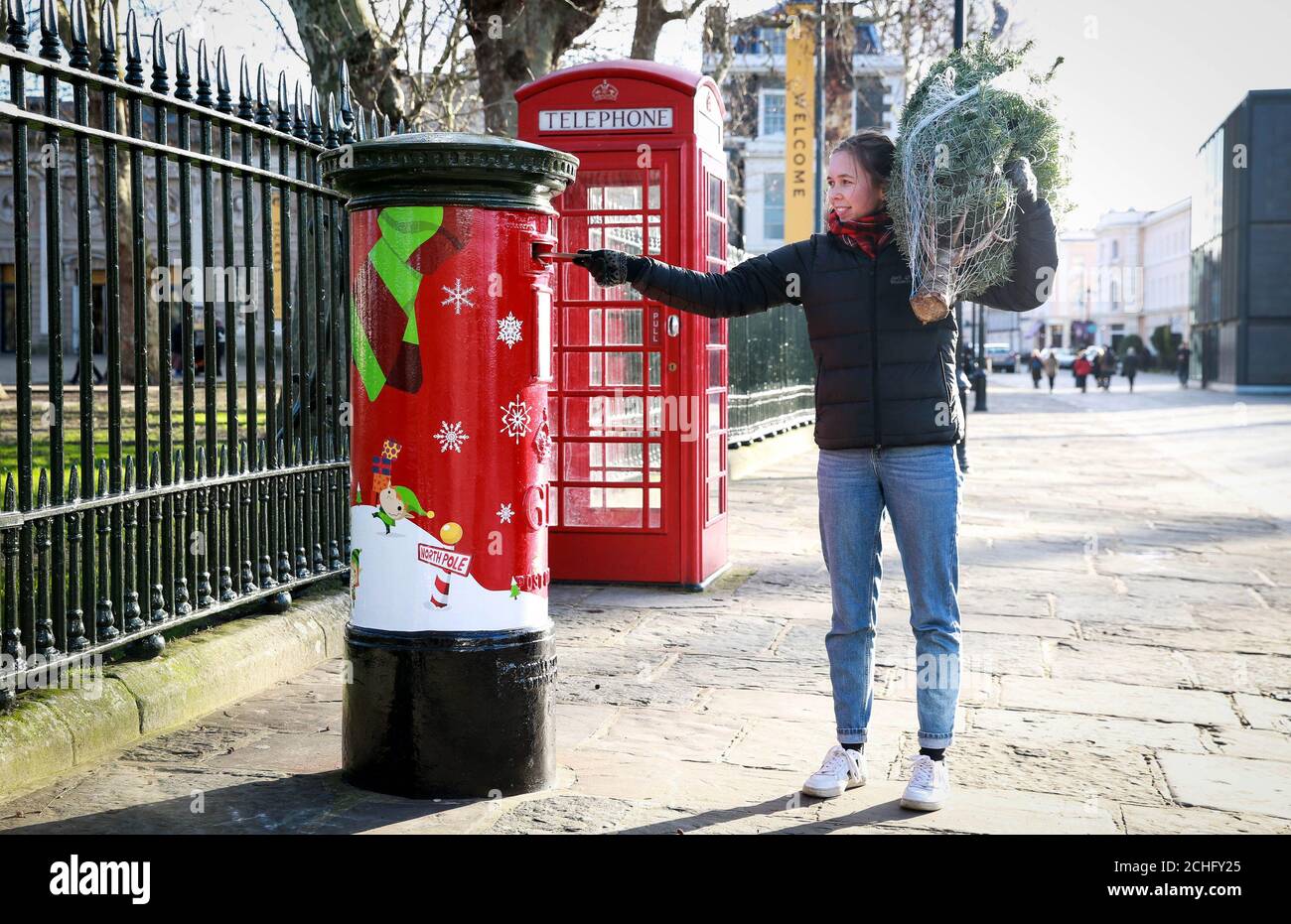 EDITORIAL USE ONLY Naomi Dixon posts letters into a 'talking' festive ...