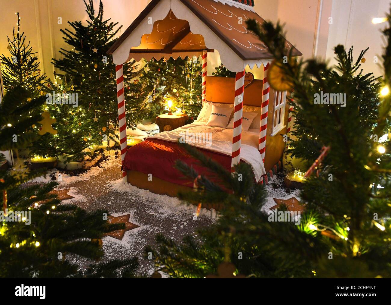 EDITORIAL USE ONLY A Candy Cane House is unveiled in Soho by Booking ...