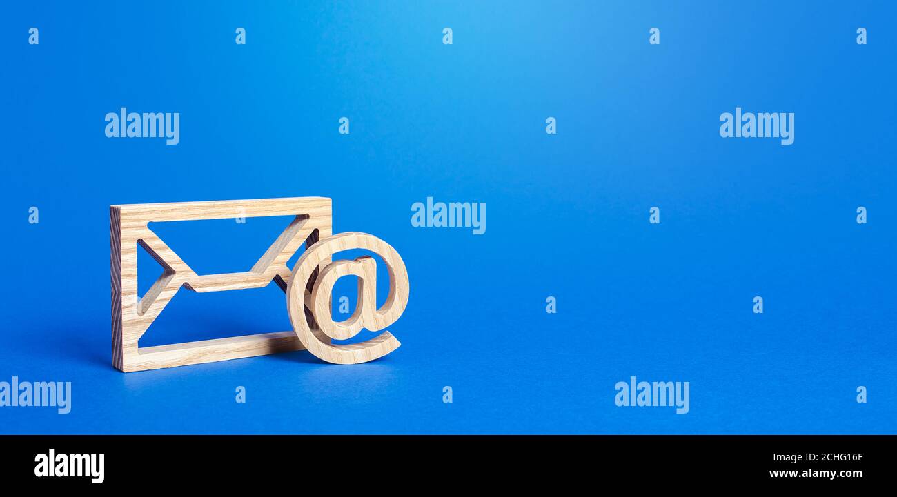 Email figure on blue background. Envelope and AT commercial sign symbol ...