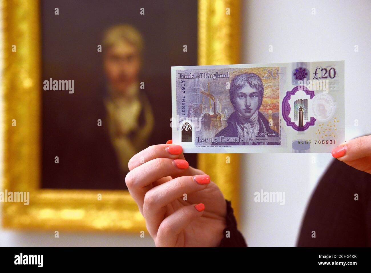 A person holds the new £20 note which features artist JMW Turner next ...