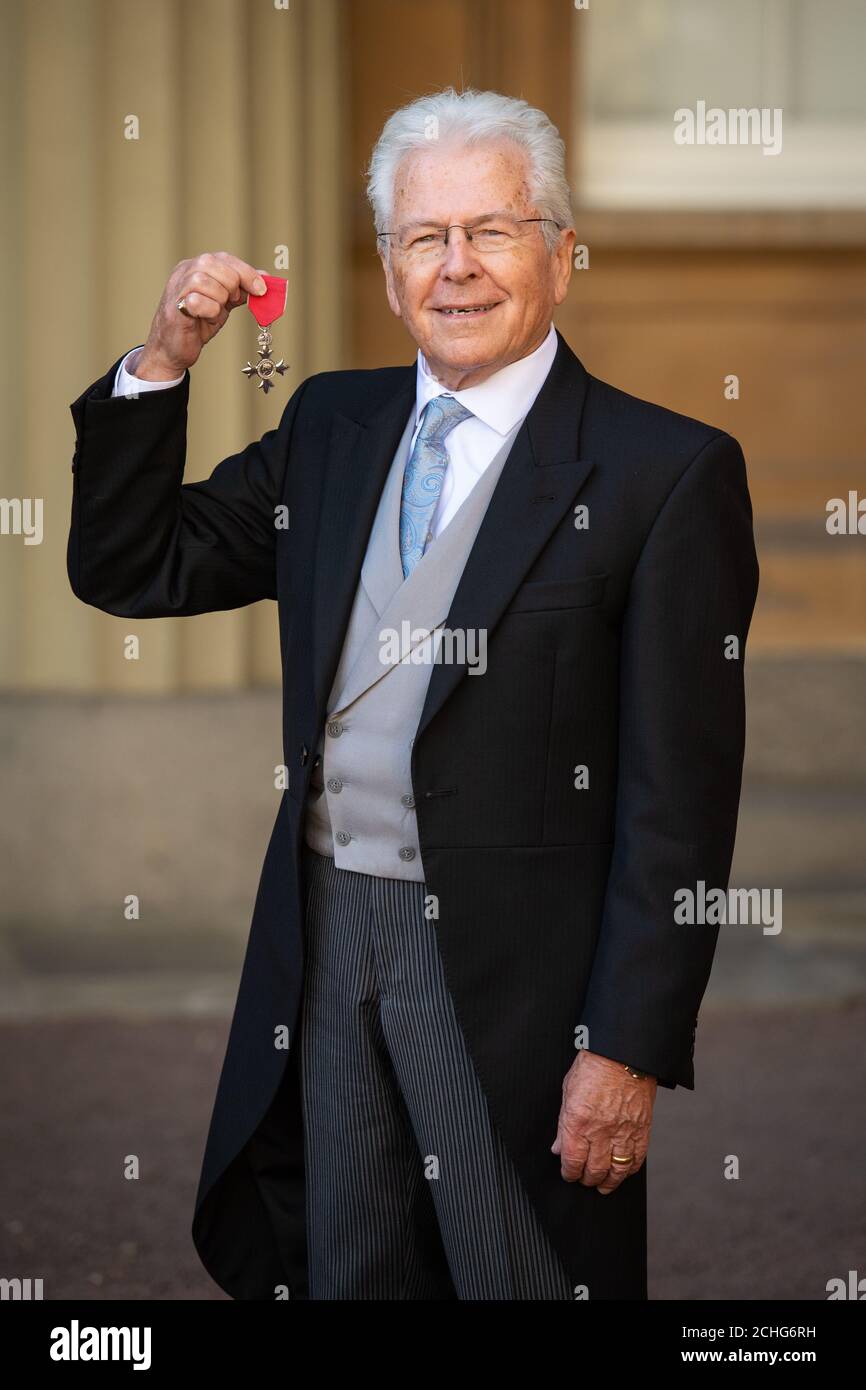 Singer Mike Pender with his MBE medal, awarded by the Prince of Wales ...