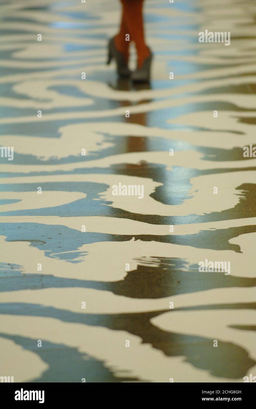 A person walks over Richard Long's White Water Line, which won the 1989 ...