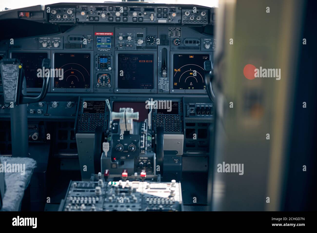 Airplane cockpit with control panel and flight displays Stock Photo - Alamy