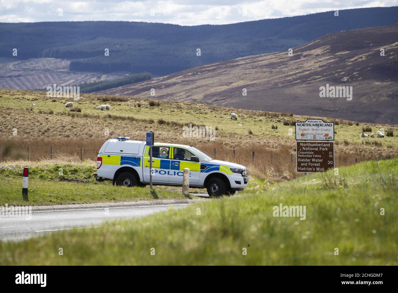 Police patrol the Scotland-England border on the A68 near Jedburgh in ...