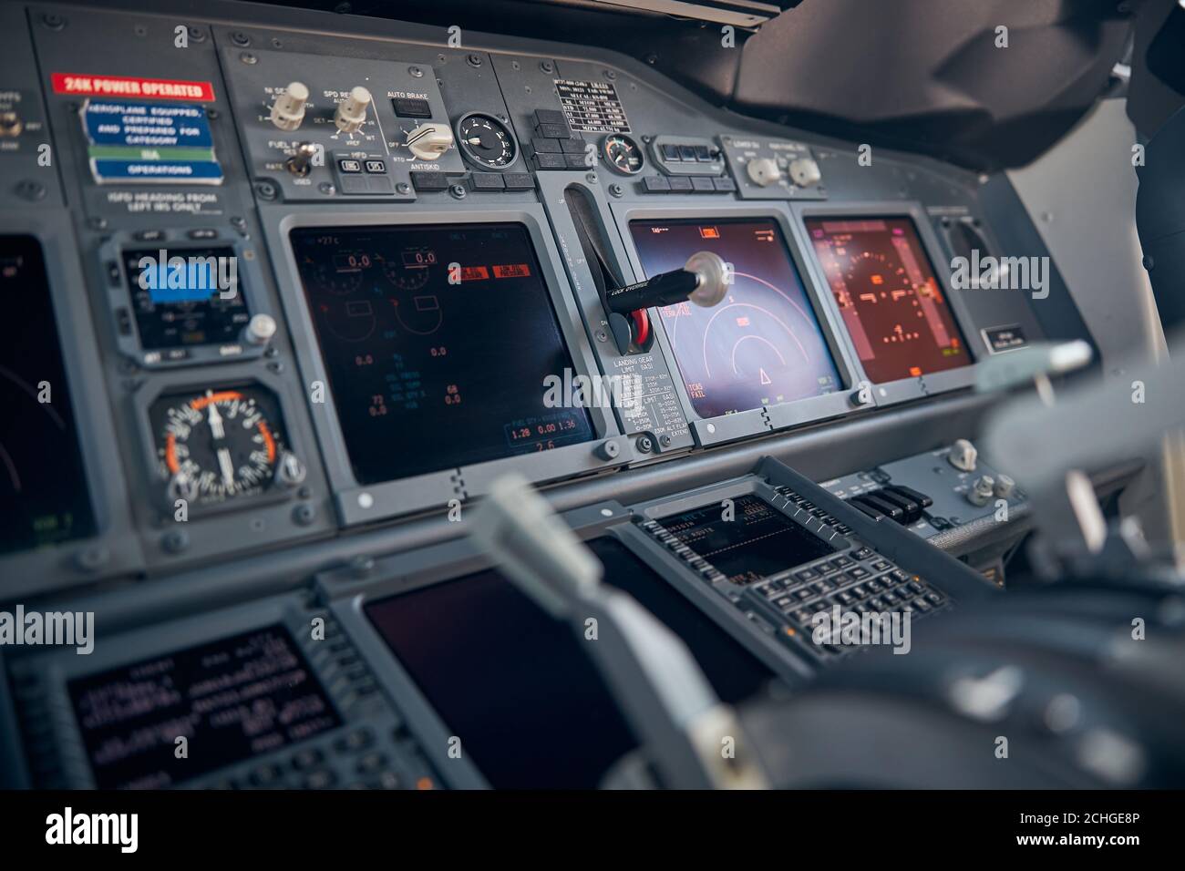 Aircraft flight deck with flight displays, switches and knobs Stock ...