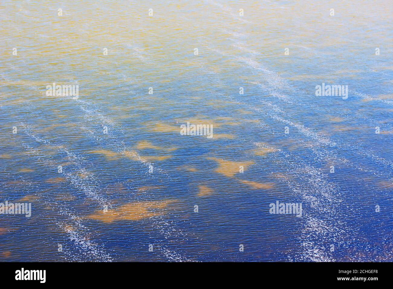 Shallow water background with small waves Stock Photo - Alamy
