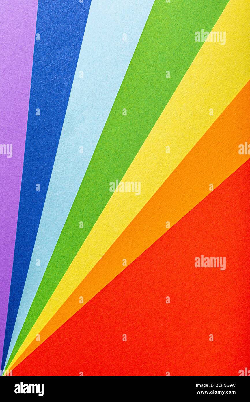 Paper rainbow colored rays stripes background Stock Photo - Alamy