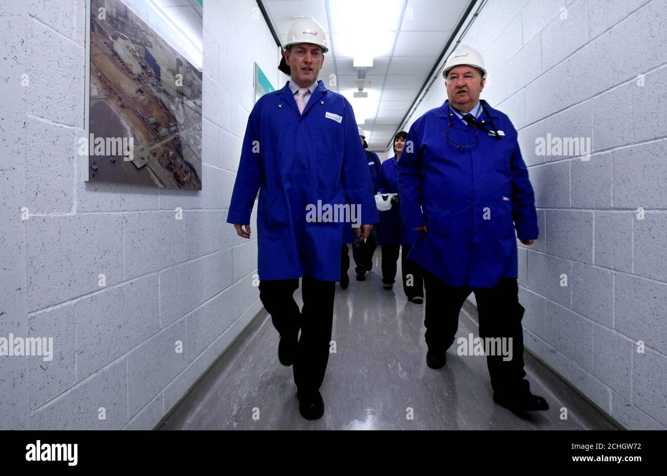 Trade and Industry Secretary of State John Hutton MP, is given a tour ...