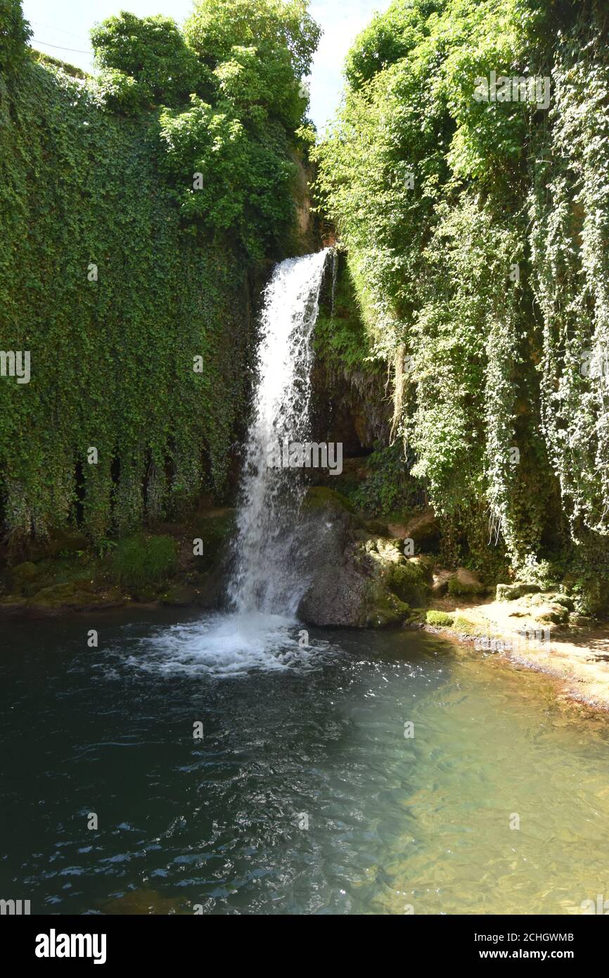 Vertical shot of a waterfall Stock Photo - Alamy