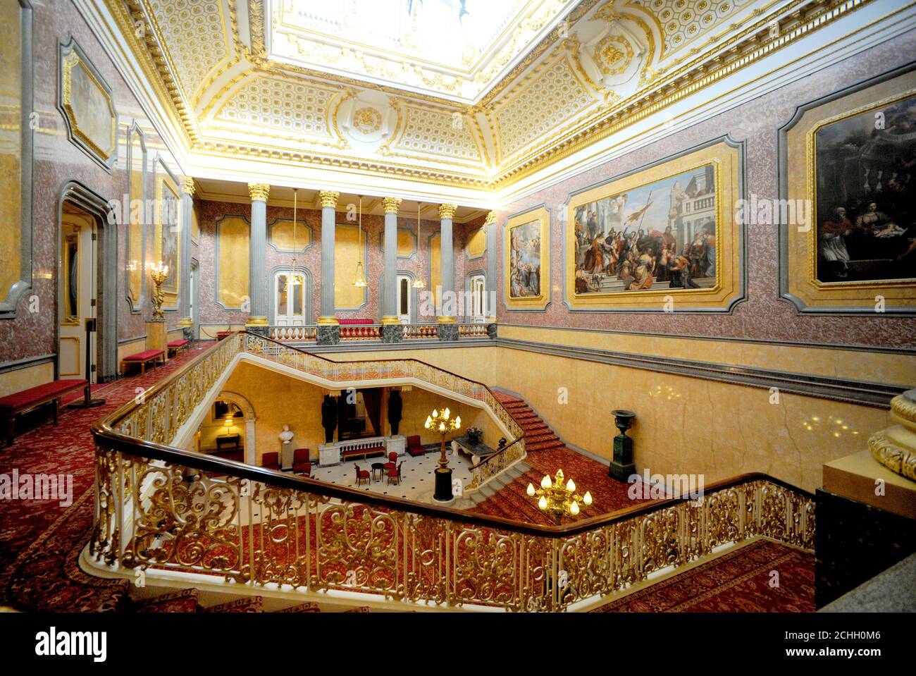 The impressive entrance hall and staircase of Lancaster House which is ...