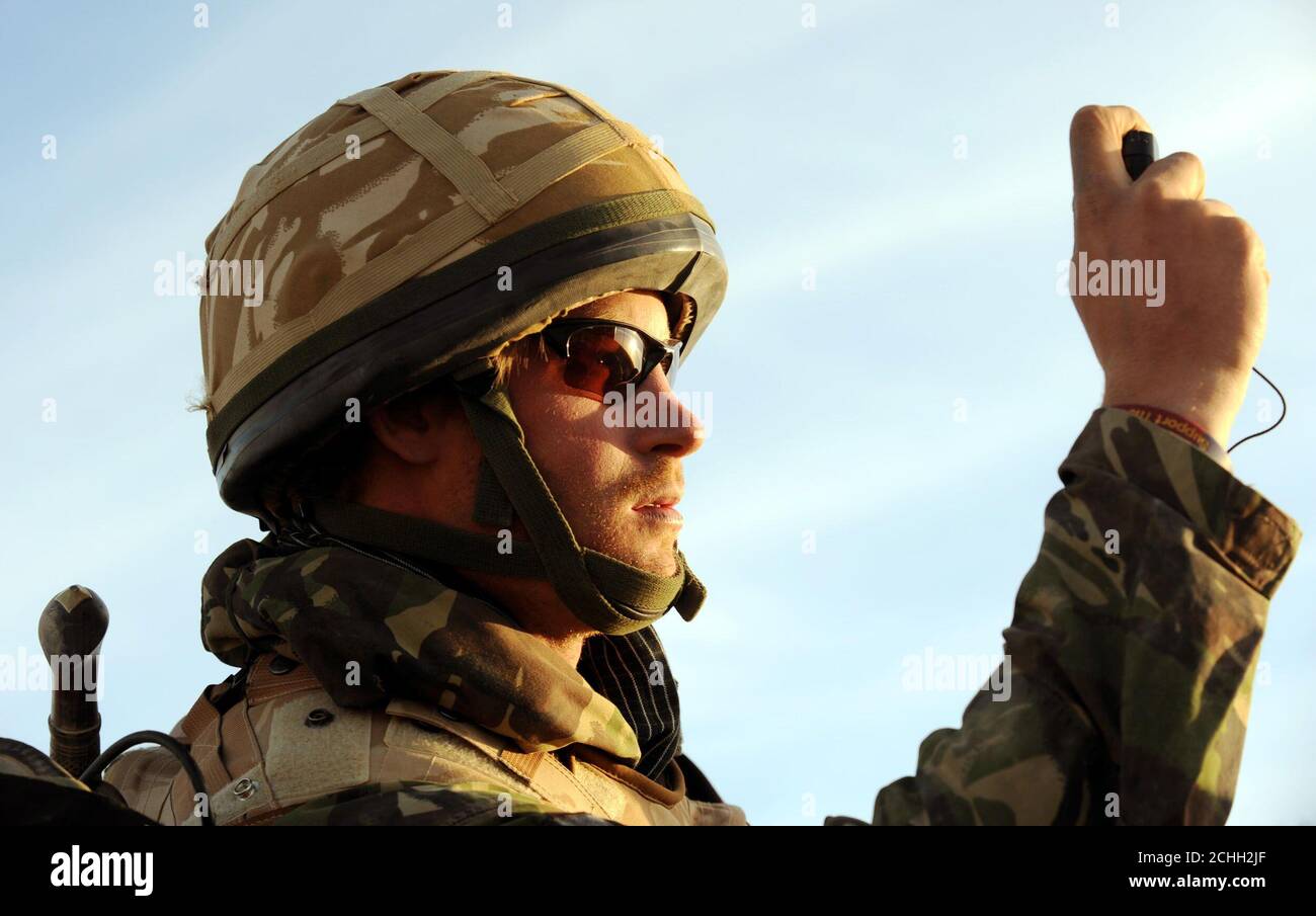 Prince Harry photographs the sunset from his spartan armoured vehicle ...