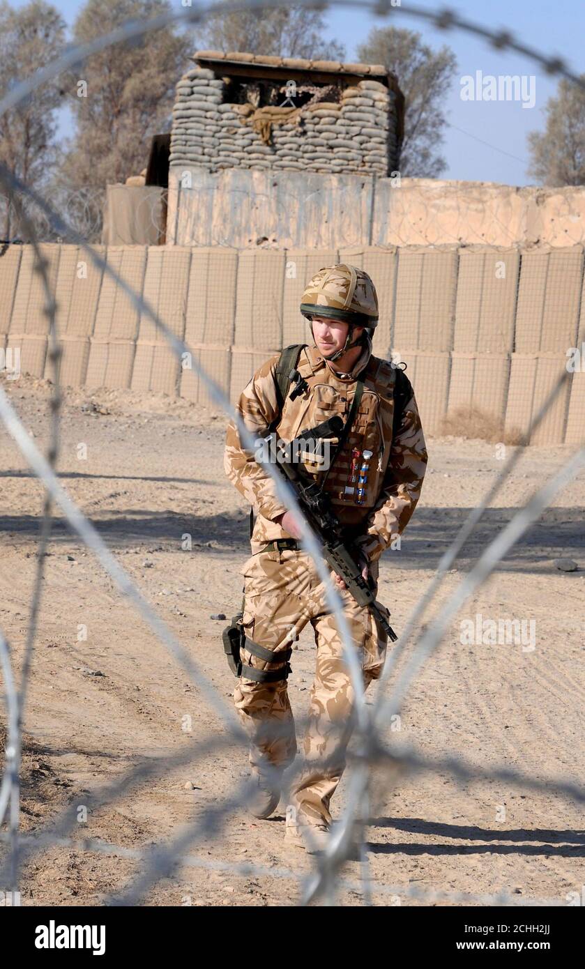 Prince Harry patrols the deserted town of Garmisir close to FOB Delhi ...