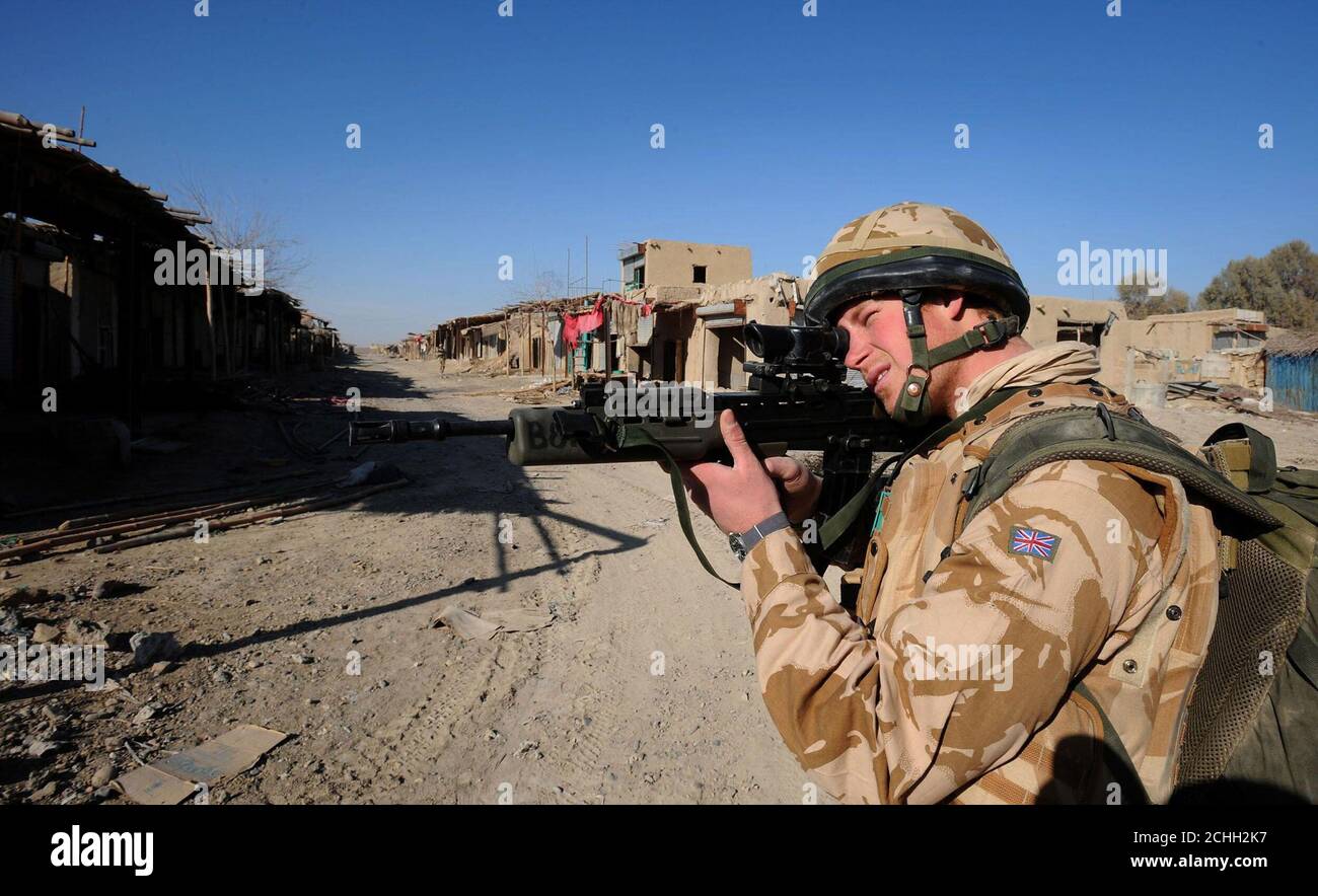 Prince Harry patrols the deserted town of Garmisir, close to FOB Delhi ...