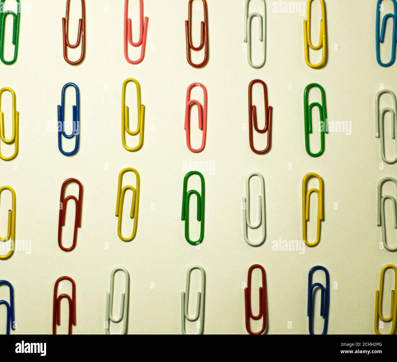 Colorful clips on a white bacground Stock Photo - Alamy