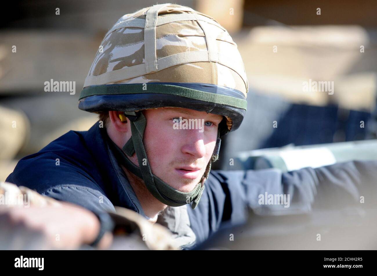 Prince Harry sits in an area of the observation post on JTAC Hill ...