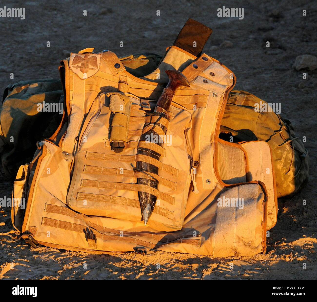 Prince Harry's body armour complete with 9mm pistol which he wore in ...