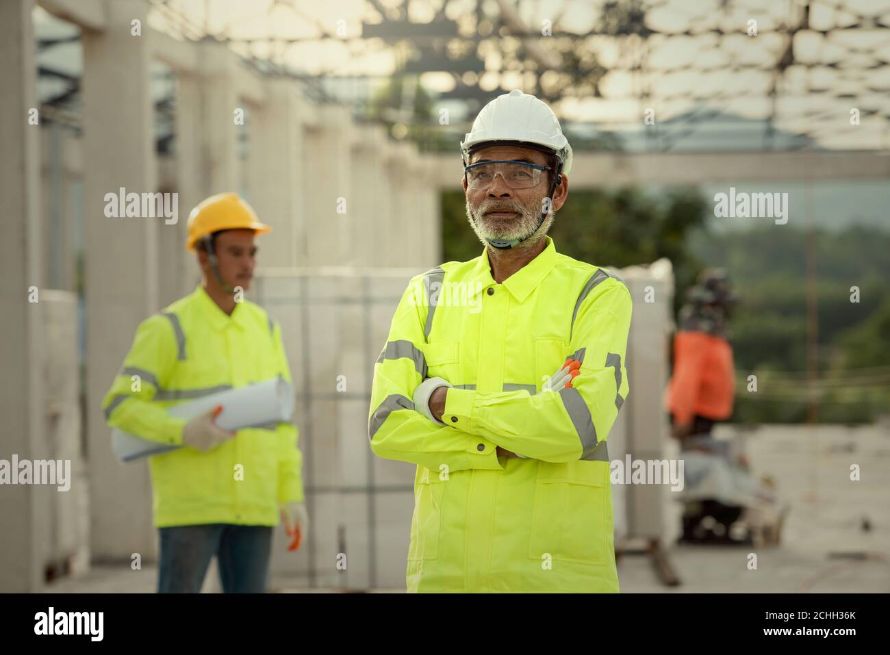 Supervisor and engineering in the construction site and blueprint Stock ...