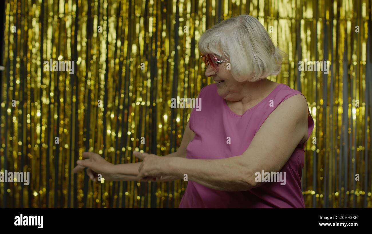 Elderly woman expressing triumph hi-res stock photography and images ...