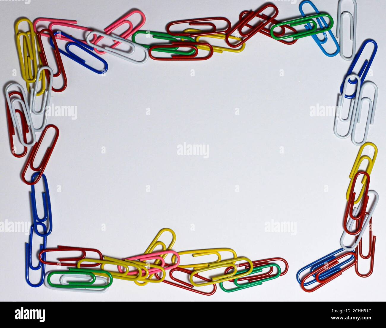 Colorful clips on a white background with a space to write Stock Photo ...