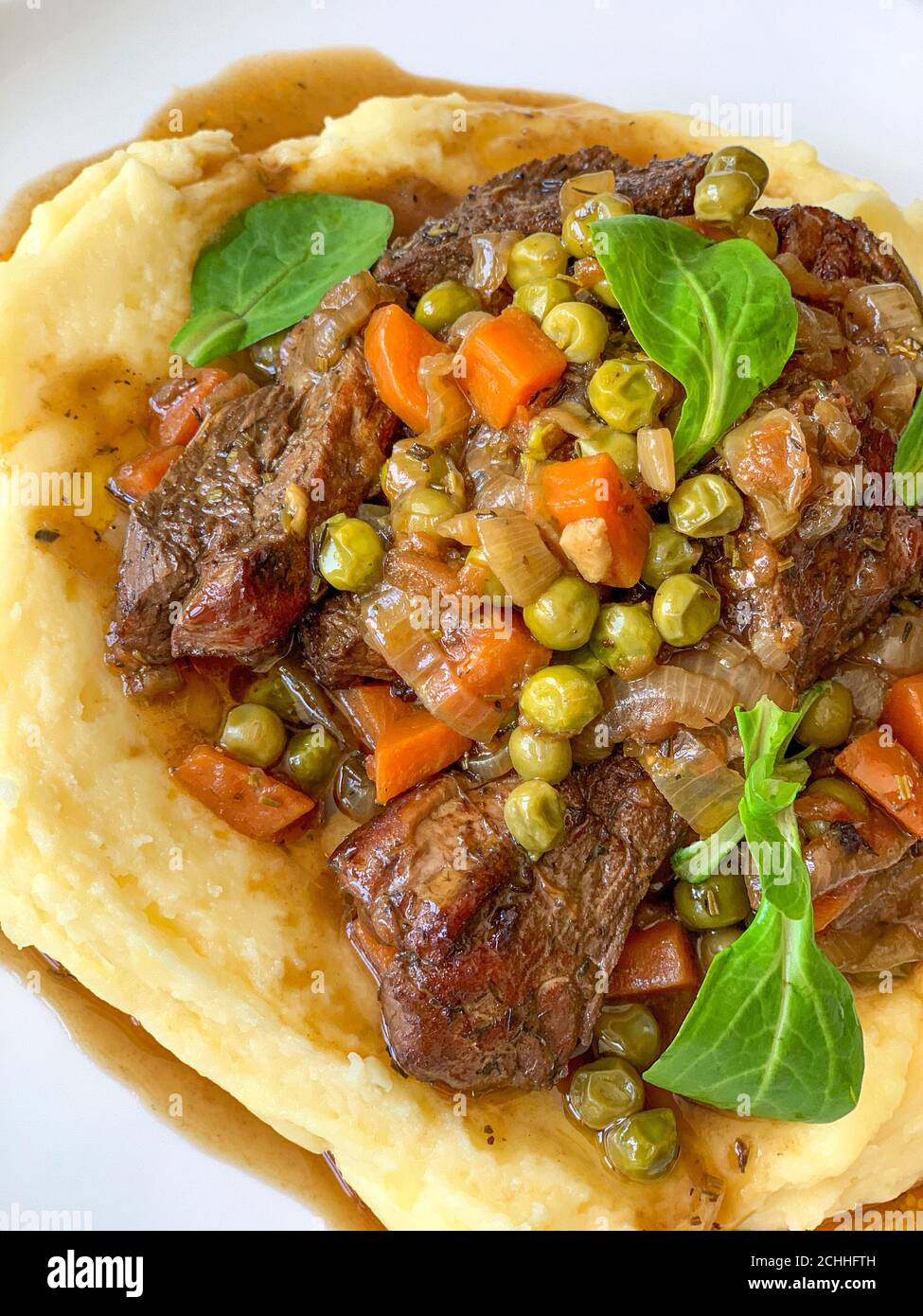 Beef ragu on mashed potatoes, homemade Stock Photo - Alamy