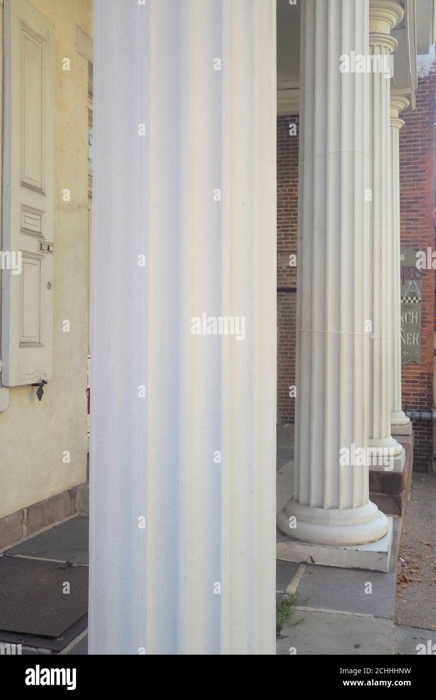 White columns outside the building Stock Photo - Alamy