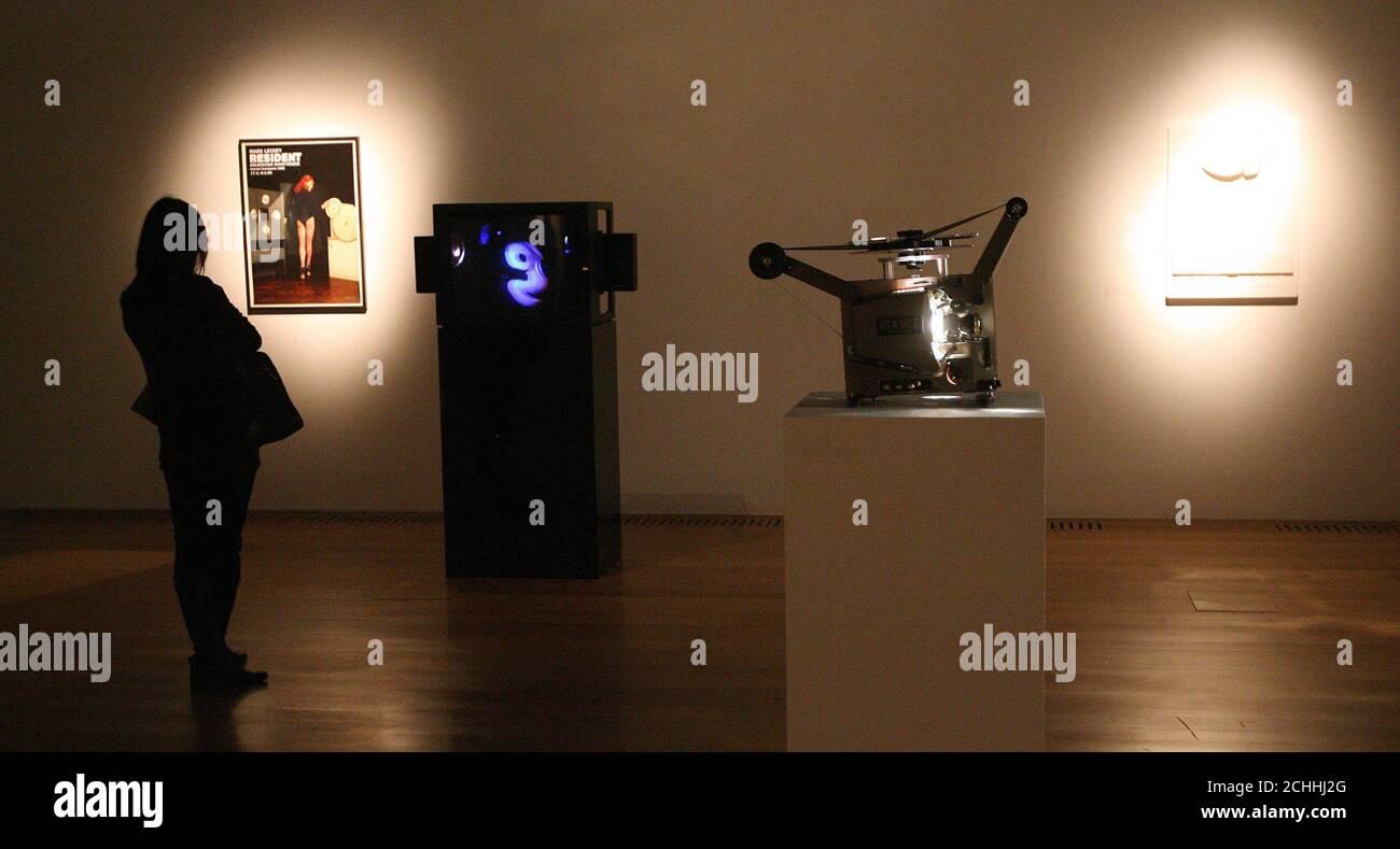 A woman studies Mark Leckey's 'Resident' Exhibition Poster 2008, at the ...