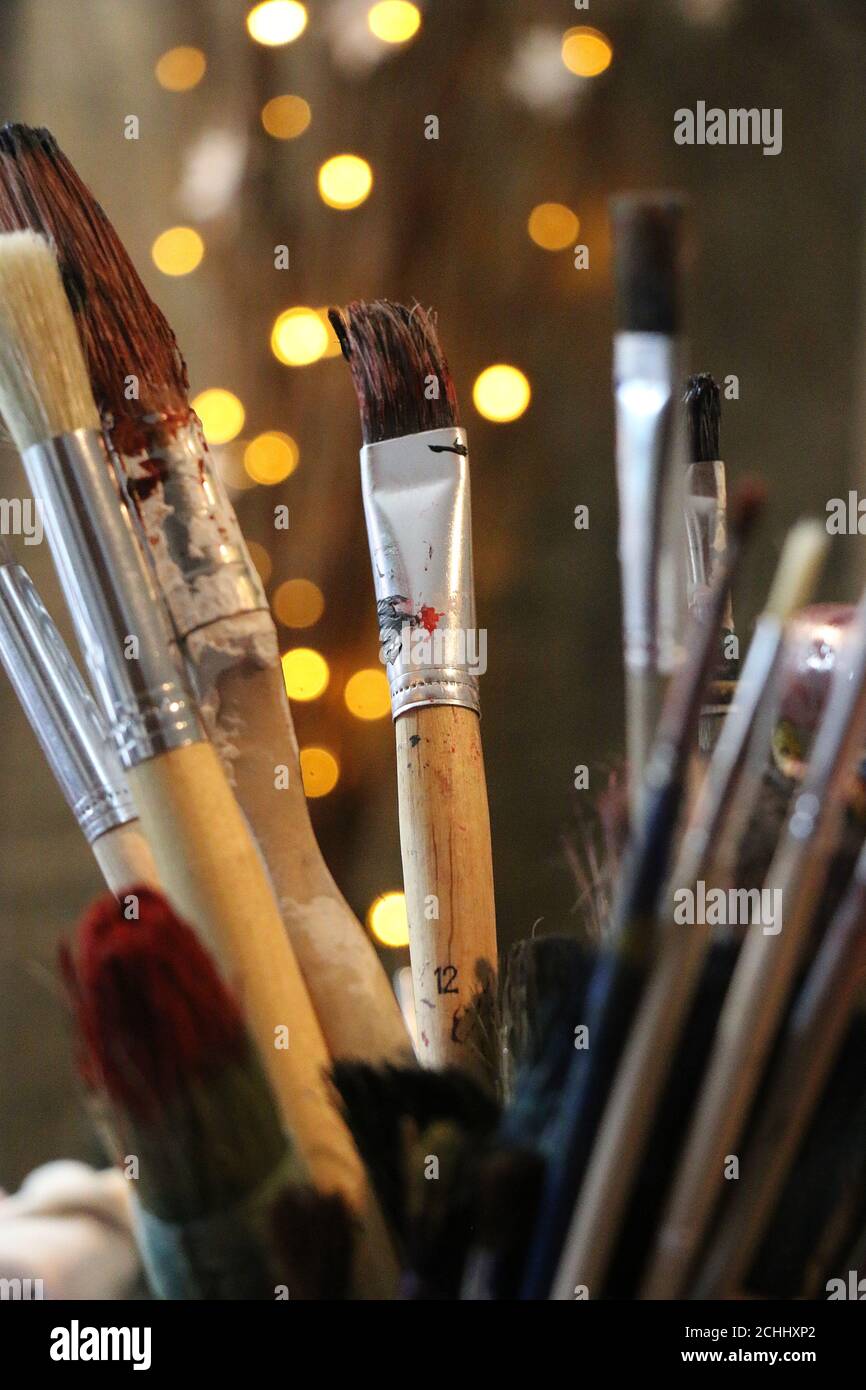 Vertical closeup shot of different paint brushes Stock Photo - Alamy