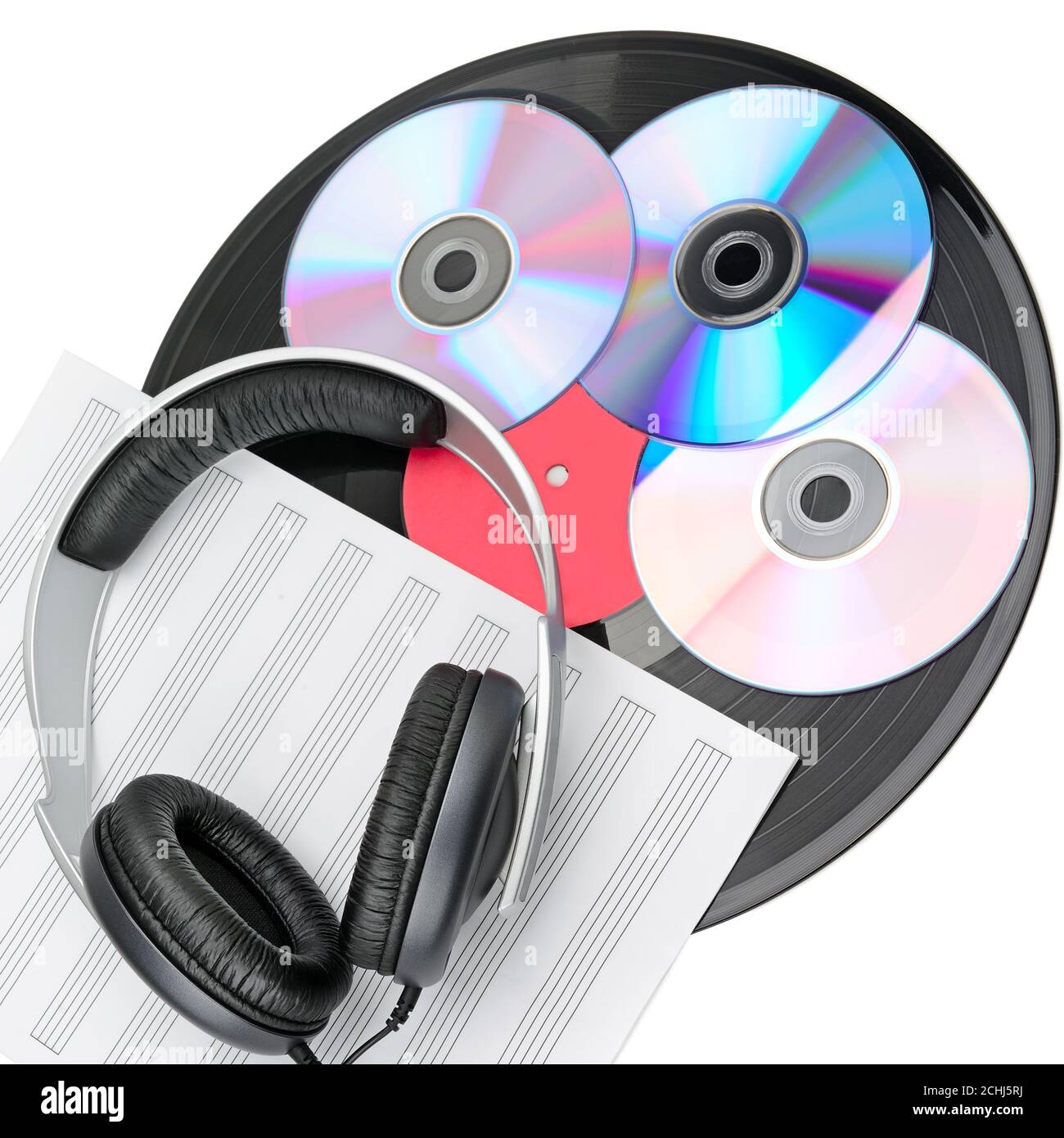 Stereo headphones, CDs and retro vinyl disc isolated on white ...