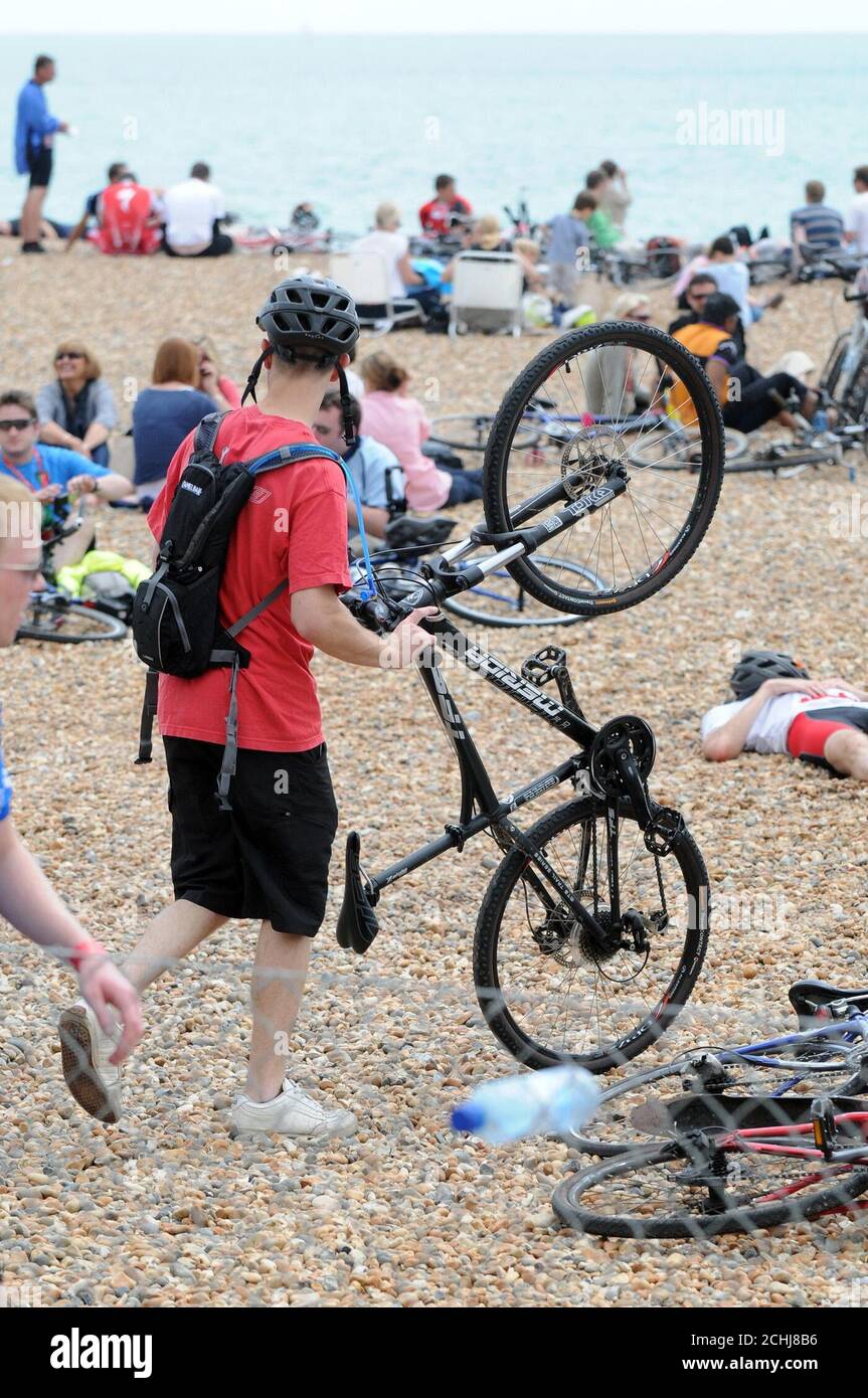 Participants on the beach at Brighton after completing the annual ...