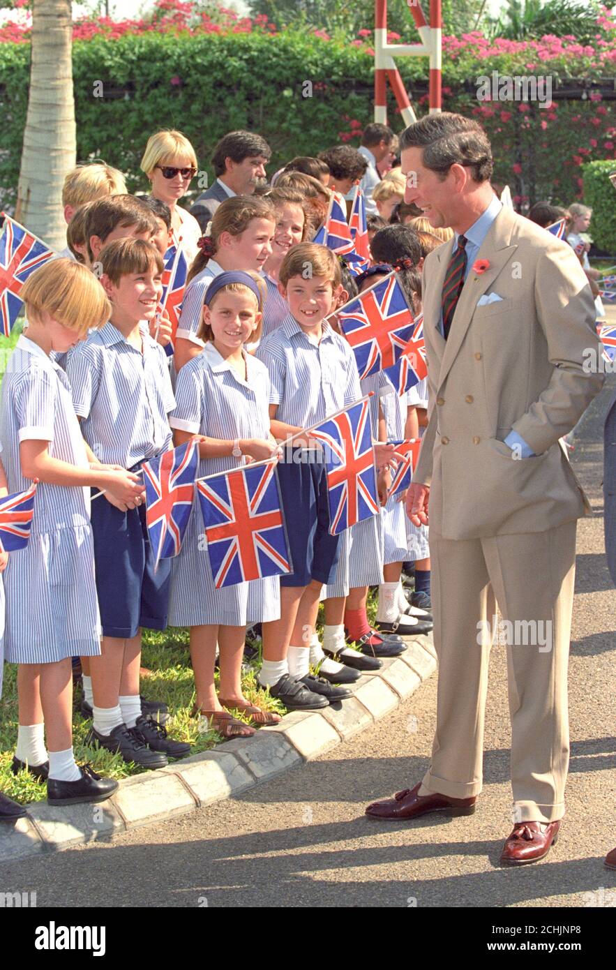 PRINCE OF WALES TALKS TO FLAG WAVING CHILDREN DURING A VISIT TO THE ...