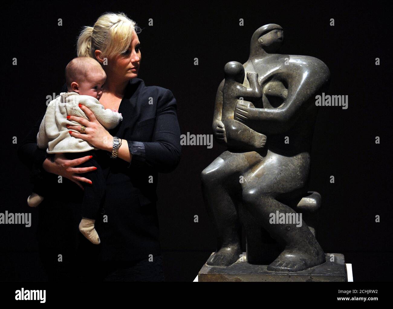 Lucy Rock and son Tommy with 'Mother and Child' 1932, by Henry Moore ...