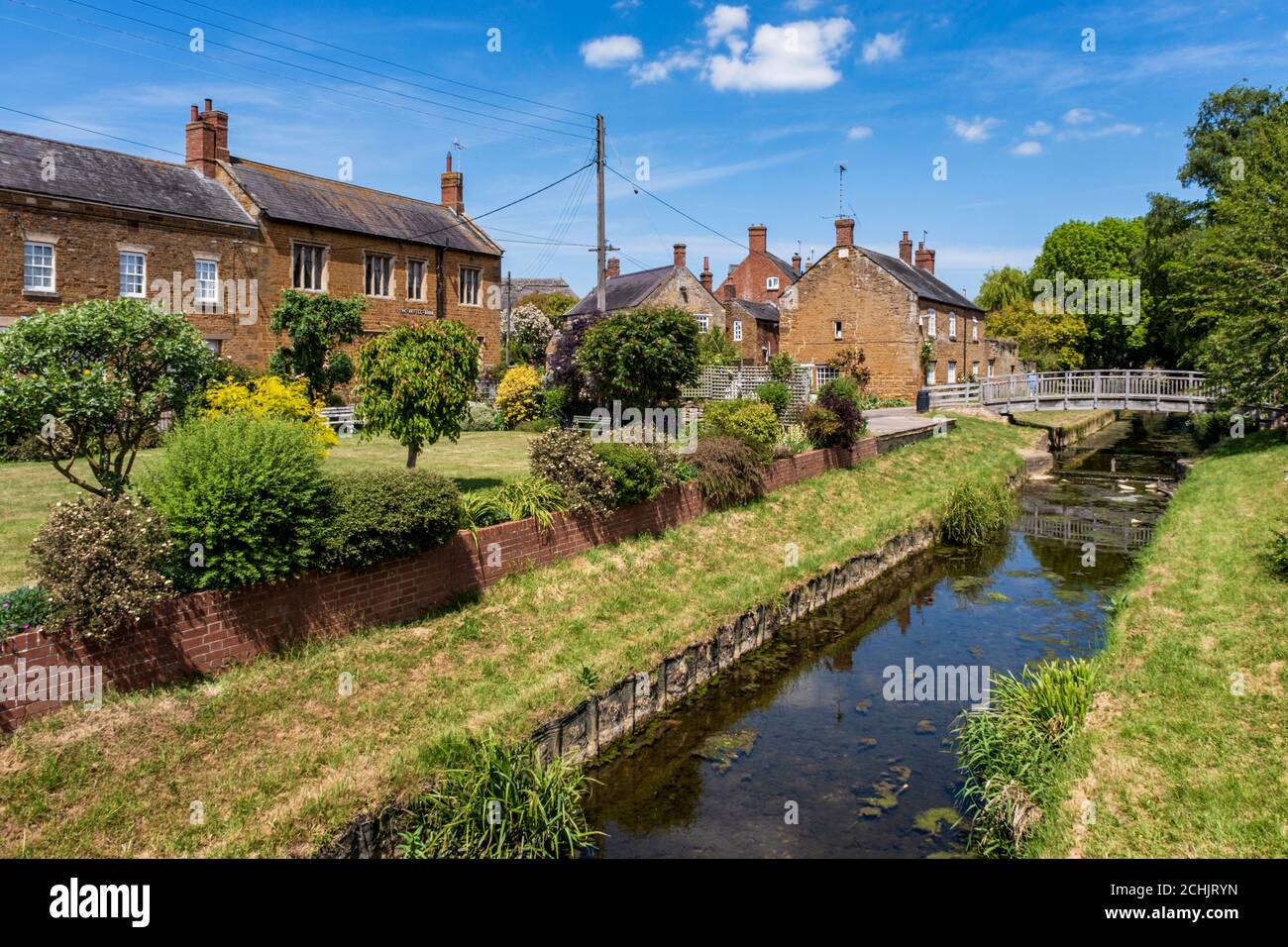 The Medbourne Brook flows prominently through the village centre of ...