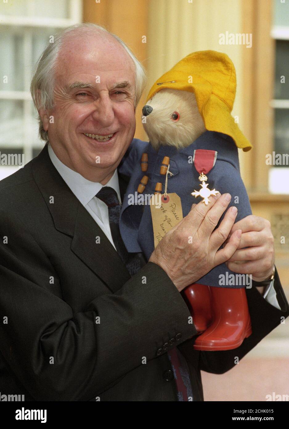Author Michael Bond and his creation, Paddington Bear, at Buckingham ...
